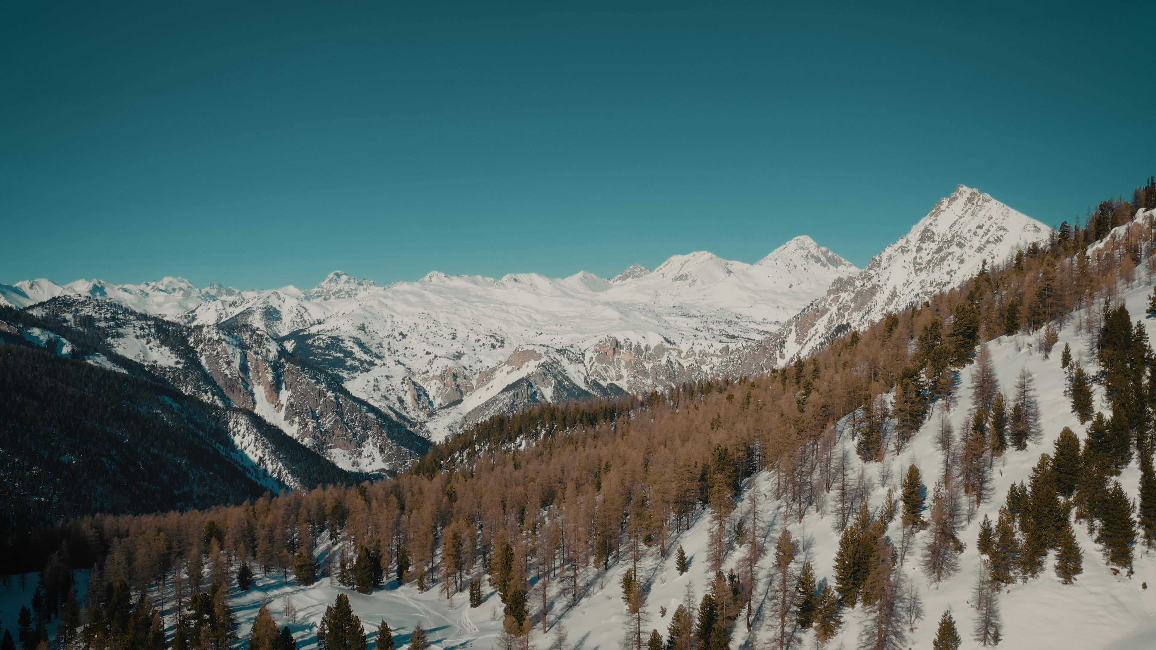 Discover flying-over-snowy-mountains, a story-driven footage
