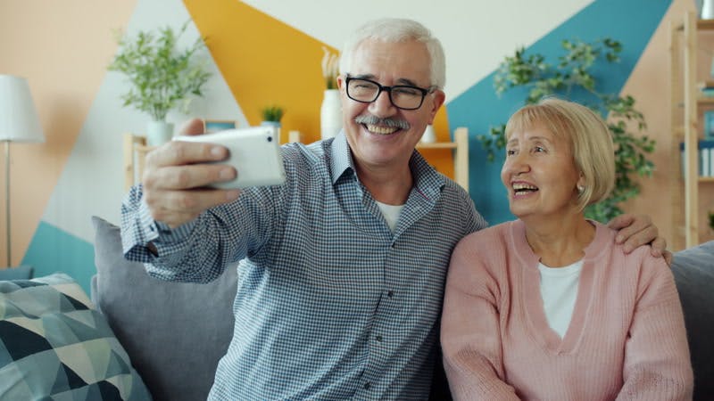 Smiling, Selfie, Smartphone, Living Room by VITALY GARIEV – Stock ...