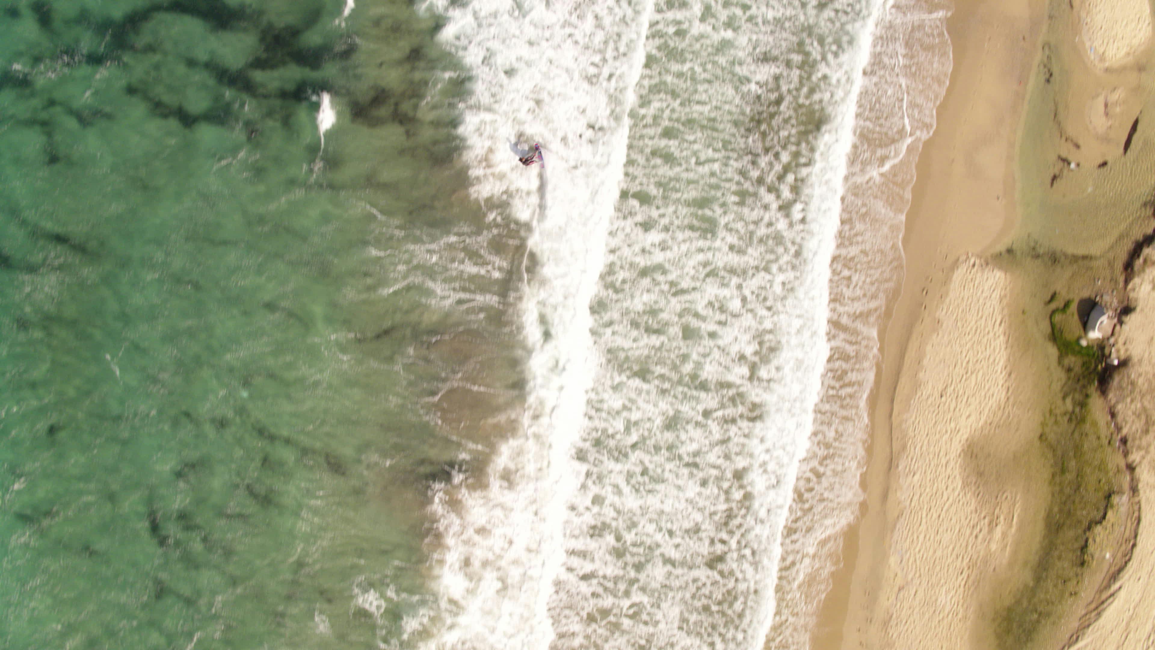 Discover kite-surfer-flying-along-waters, a story-driven footage | Artlist