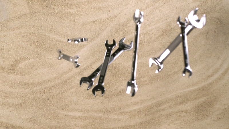 Spanner Key, Sand, Falling, Black Background by Soraphotography – Stock ...