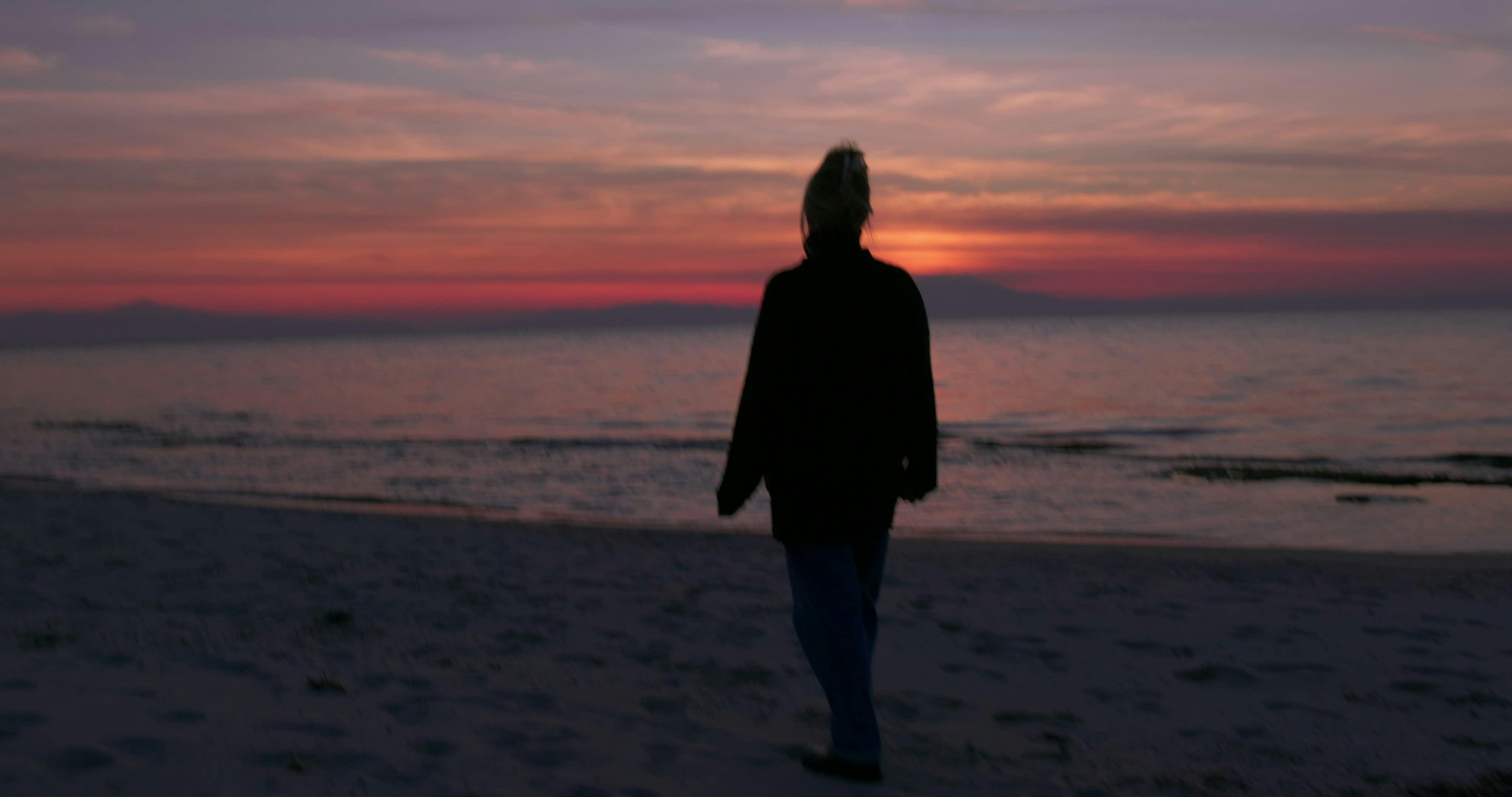 Discover older-woman-wandering-at-the-beach, a story-driven footage ...