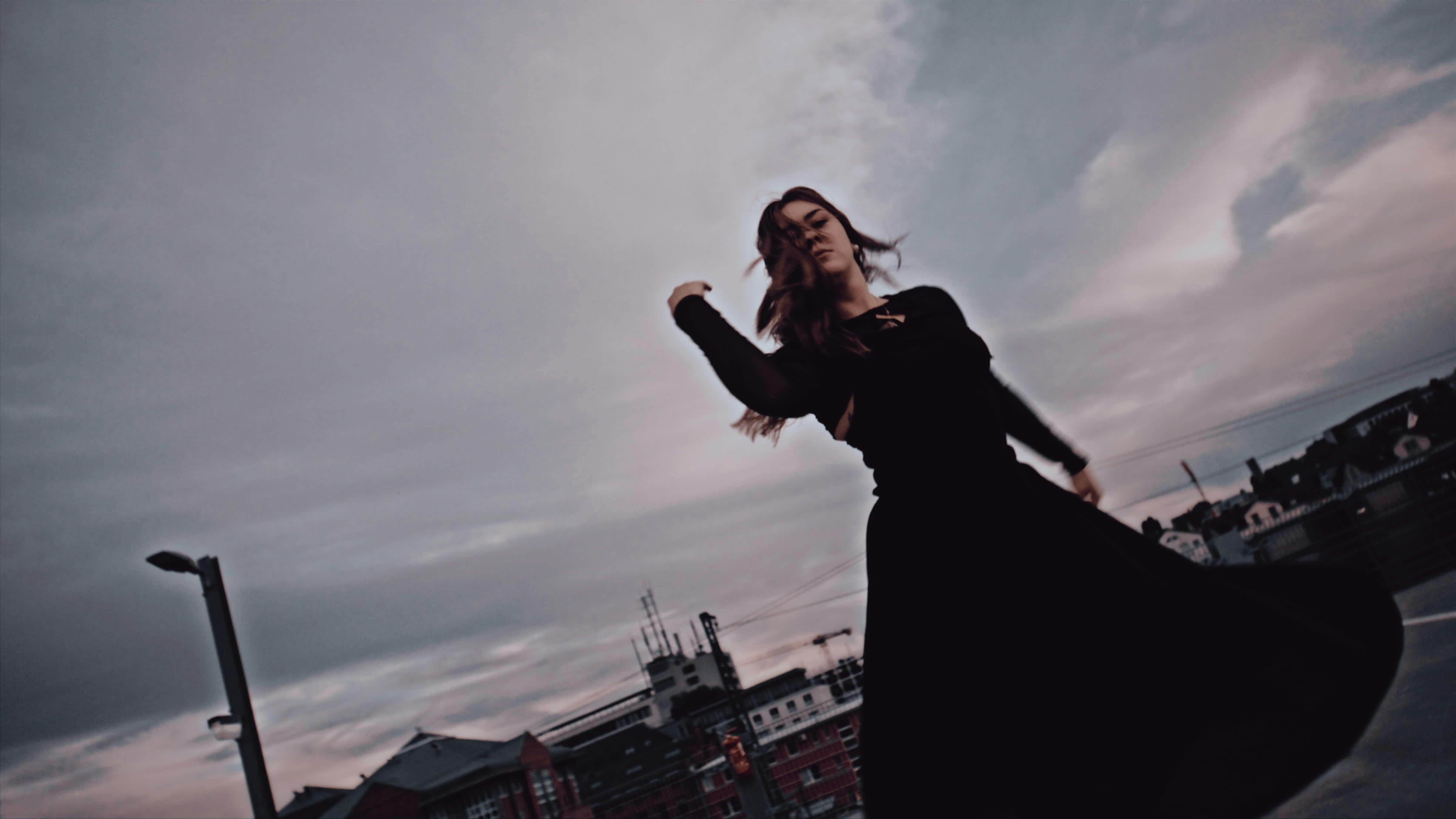 Discover woman-dancing-on-rooftop, a story-driven footage | Artlist