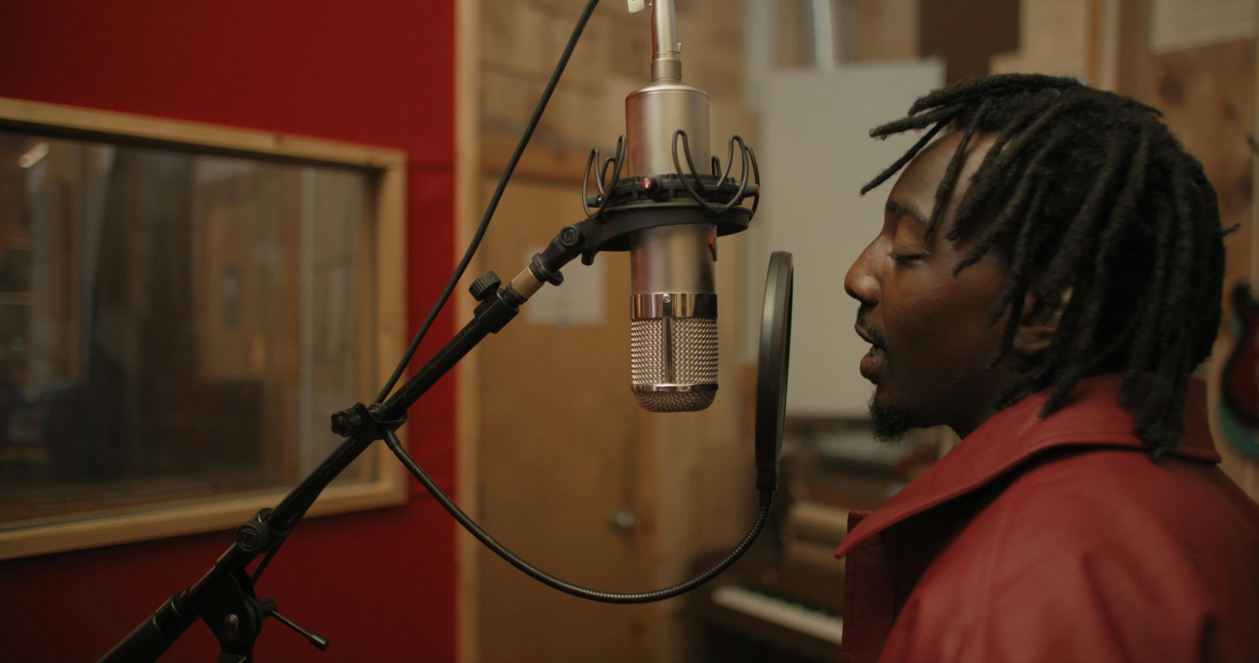 Discover rapper-in-a-recording-booth, a story-driven footage | Artlist