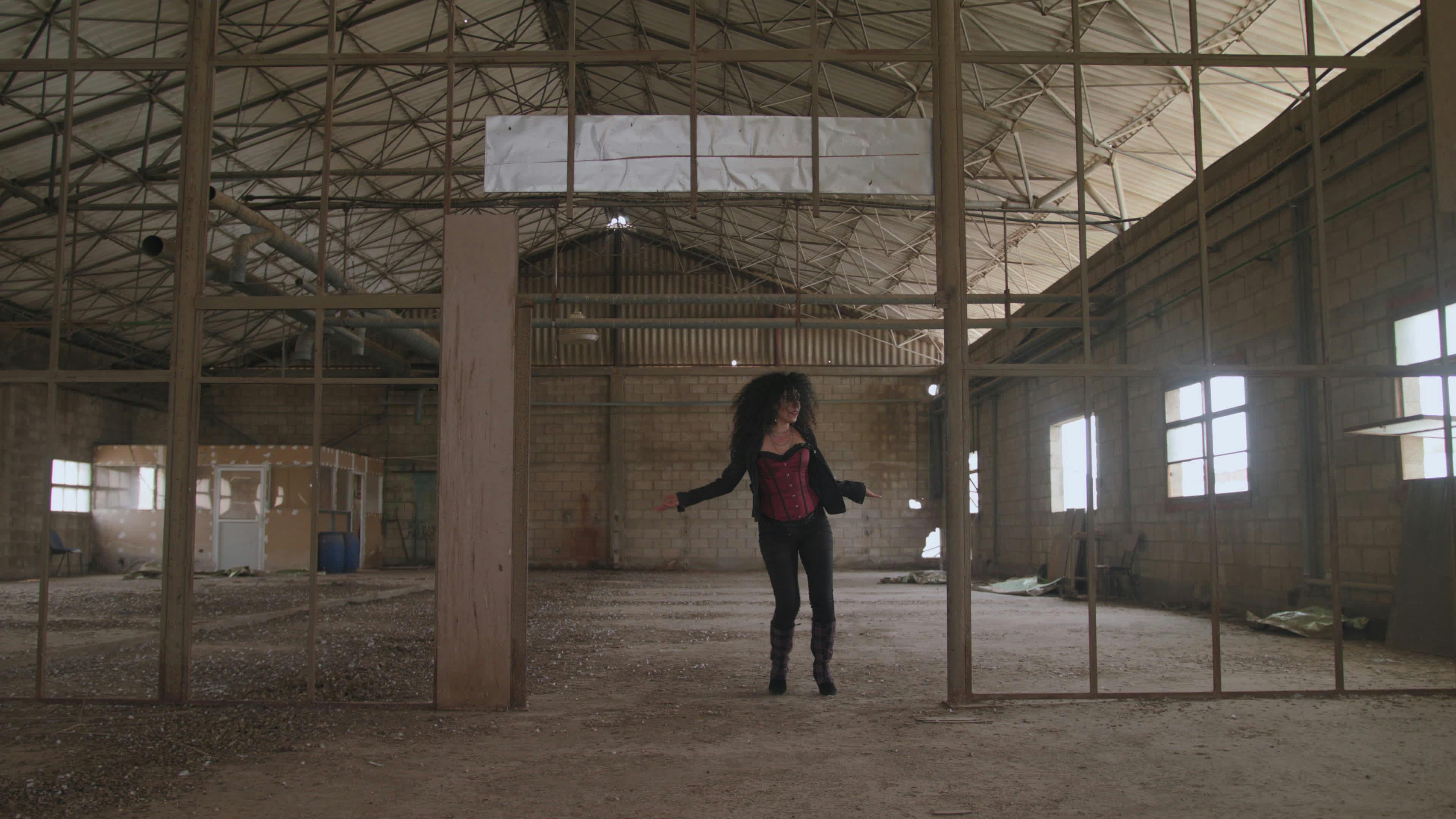 Discover woman-dancing-in-a-warehouse, a story-driven footage | Artlist