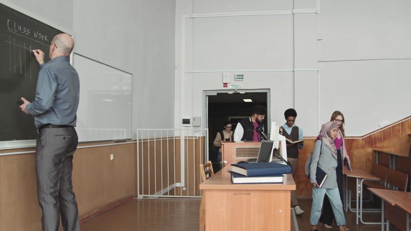 Lecture, Lecturer, Entering, Classroom by Pressmaster – Stock Footage ...