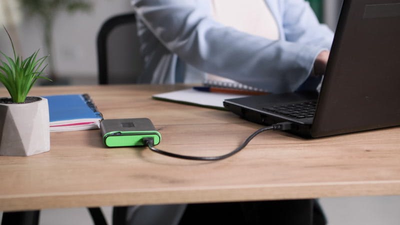 Desk, External Hard Drive, Laptop by Oleksandr Ostapchuk – Stock ...