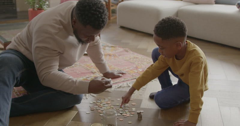 Father, Coins, Bonding, Counting by Erwin de Boer – Stock Footage | Artlist