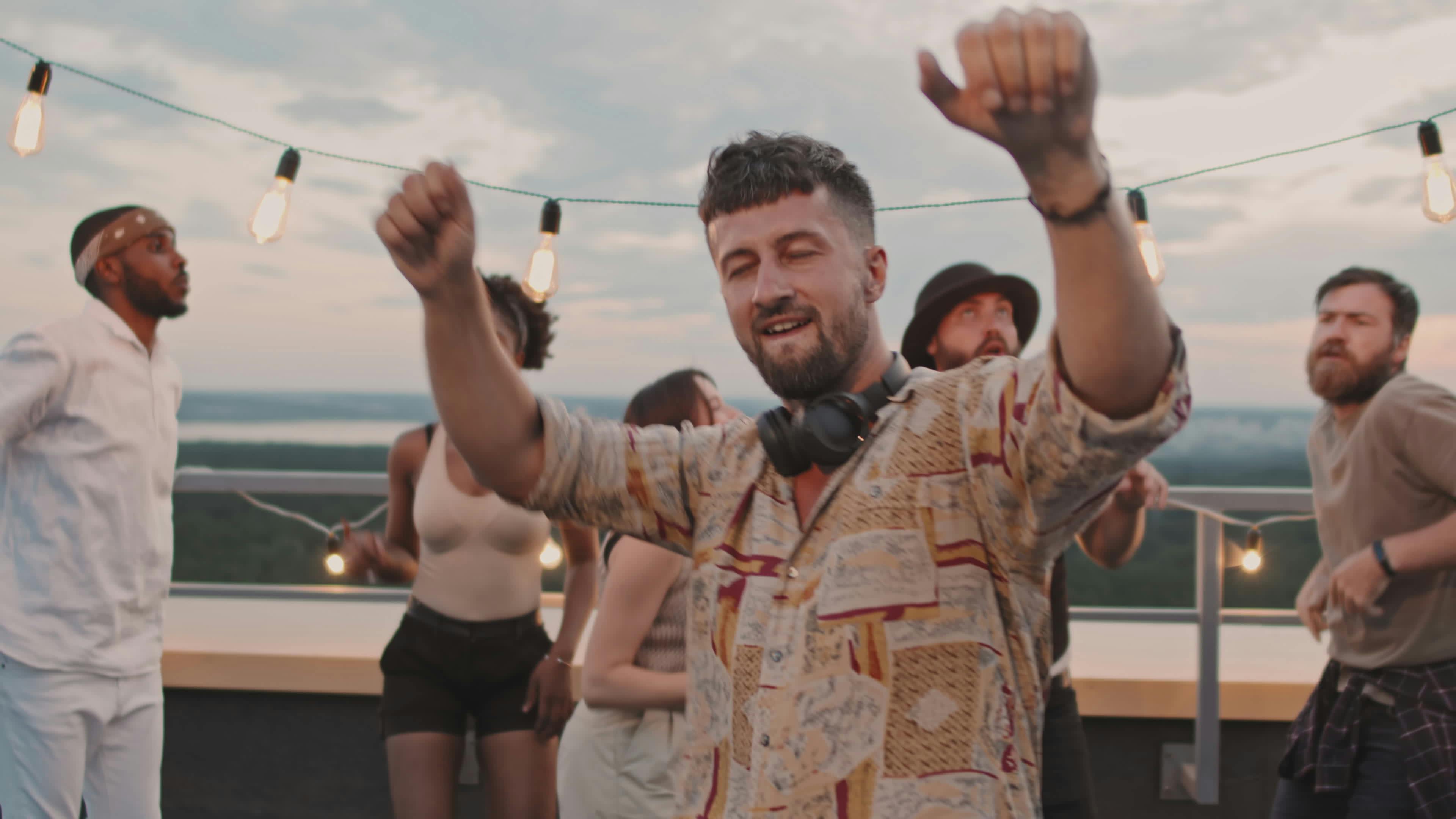 Discover rooftop-party-at-sunset, a story-driven footage | Artlist