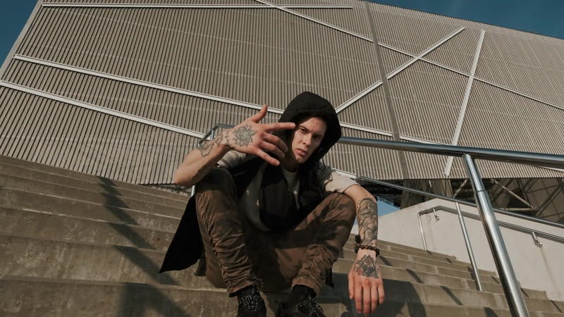 Teenager, Hand Gesture, Rapper, Sitting by Cinematic Vision – Stock ...