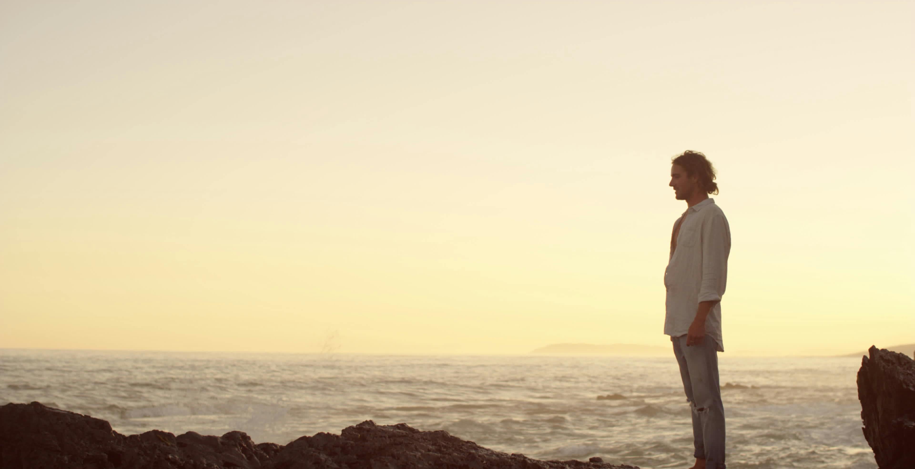 Discover man-at-the-ocean-at-sunset, a story-driven footage | Artlist