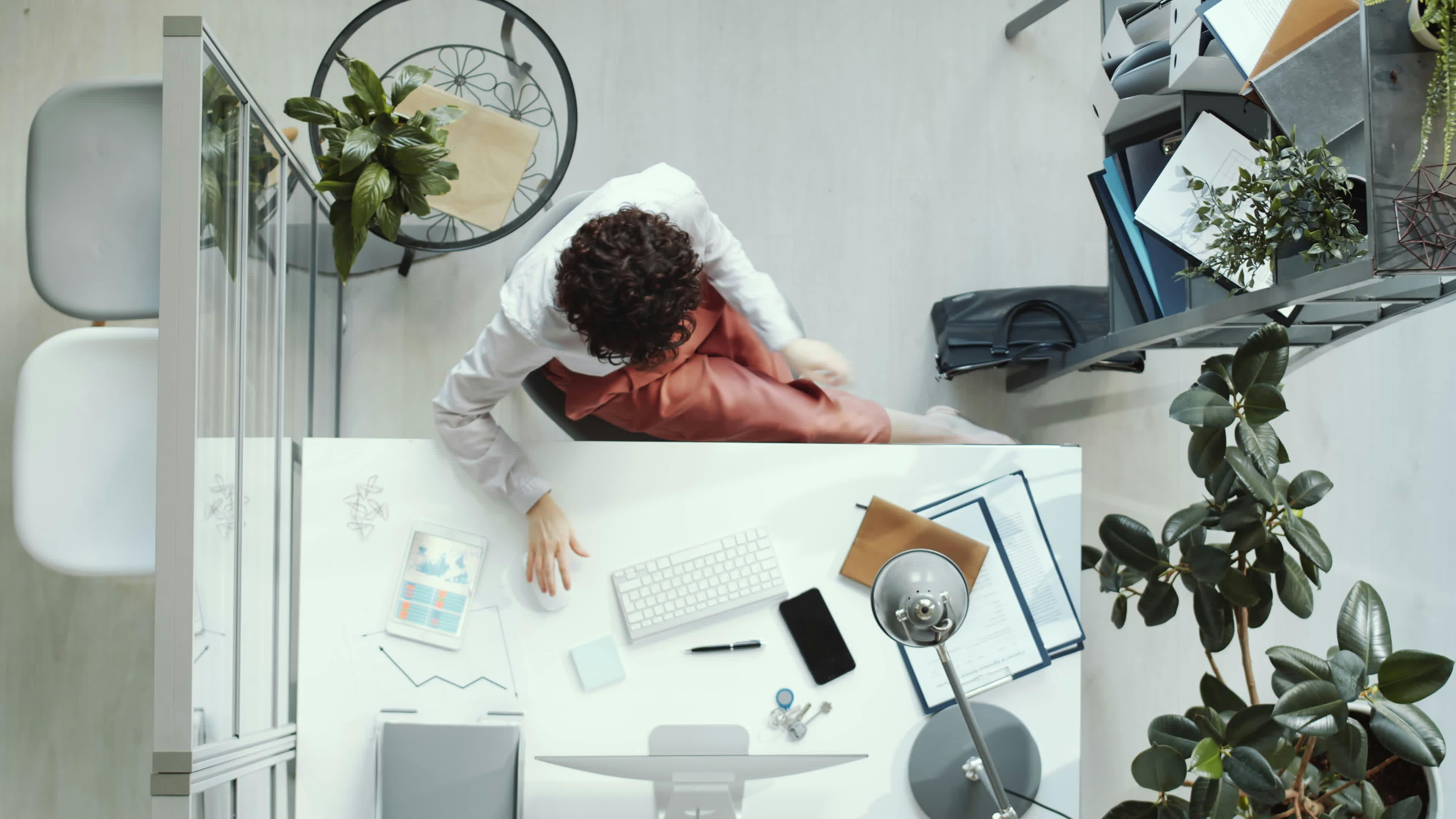 Discover top-shots-of-office-work, a story-driven footage | Artlist