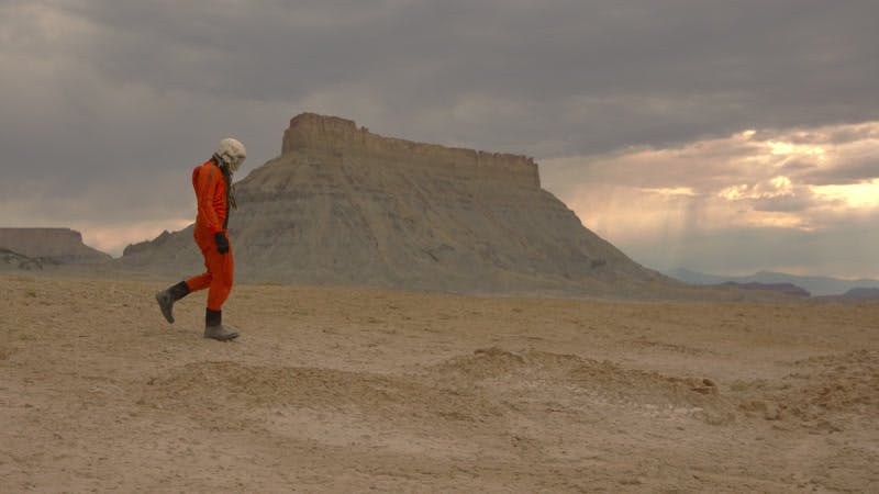 Ground, Astronaut Helmet, Orange Overalls, Desert by Tanner Fowler ...