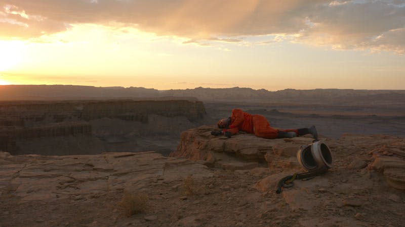 Astronaut Suit, Orange, Unconscious, Desert by Tanner Fowler – Stock ...