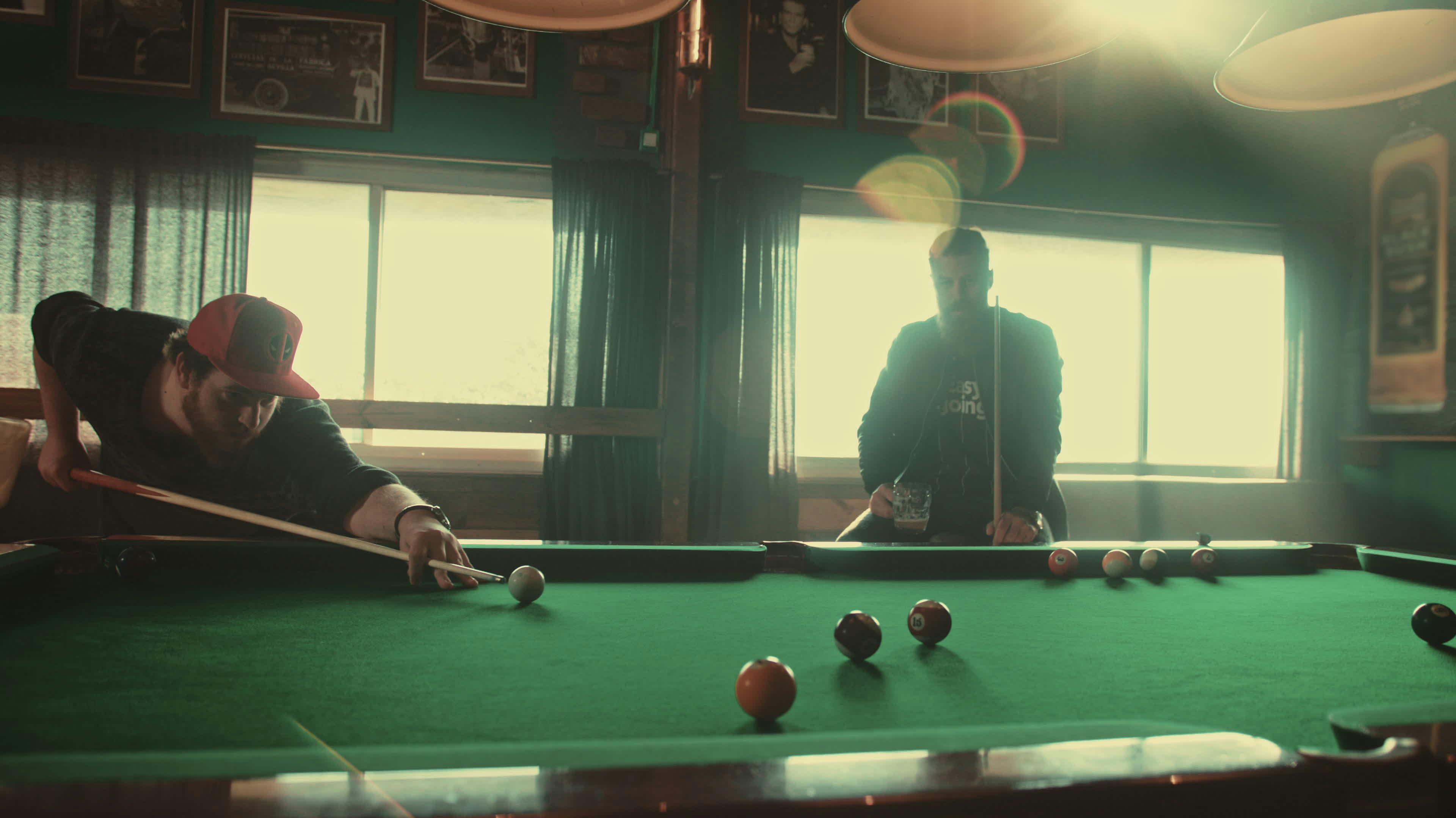 Discover two-men-playing-pool, a story-driven footage | Artlist