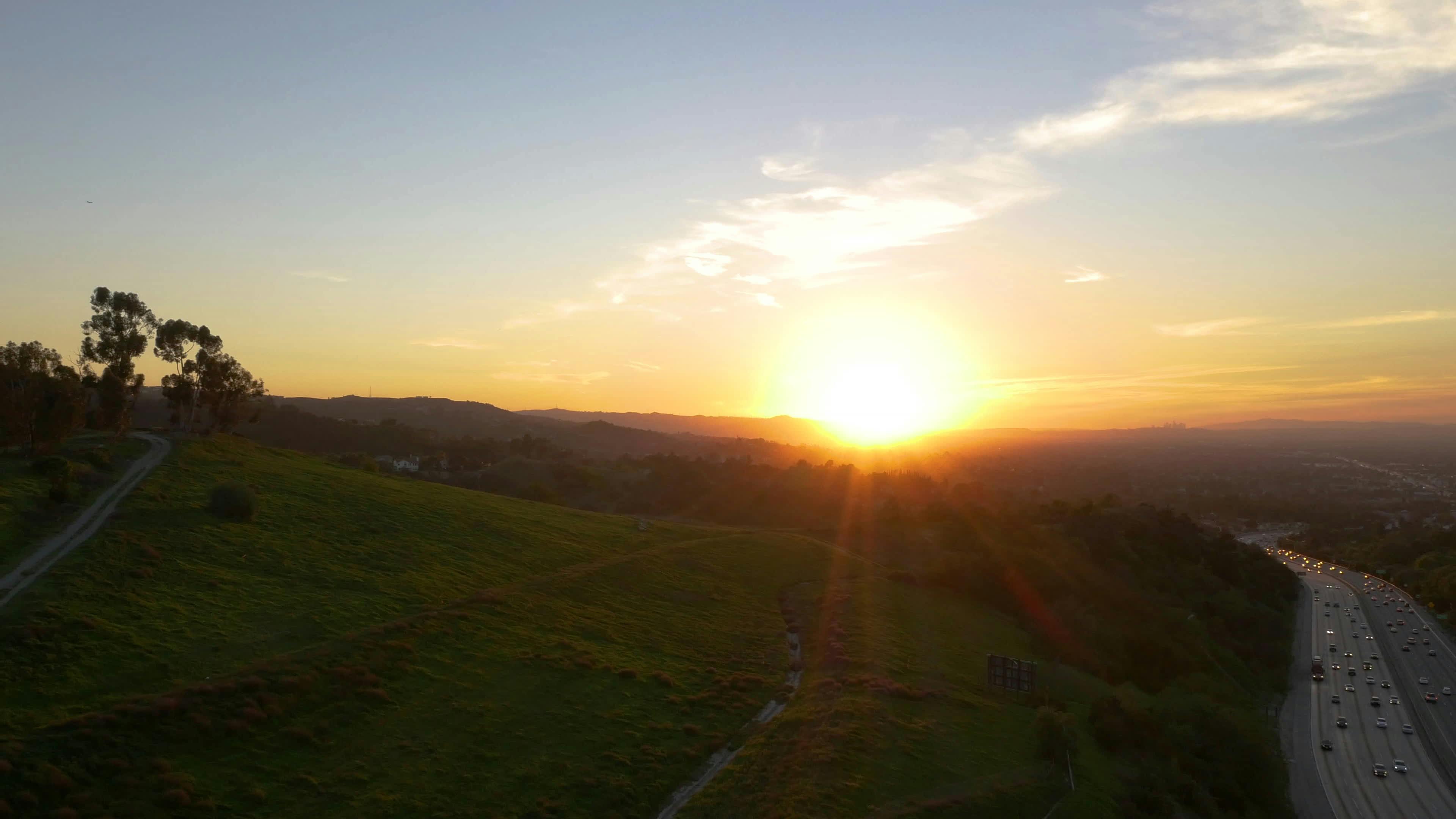 Discover freeway-at-sunset-aerial, a story-driven footage