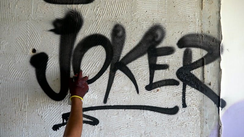 Hand, Joker, Text, Spray Paint by Lior Patel – Stock Footage | Artlist